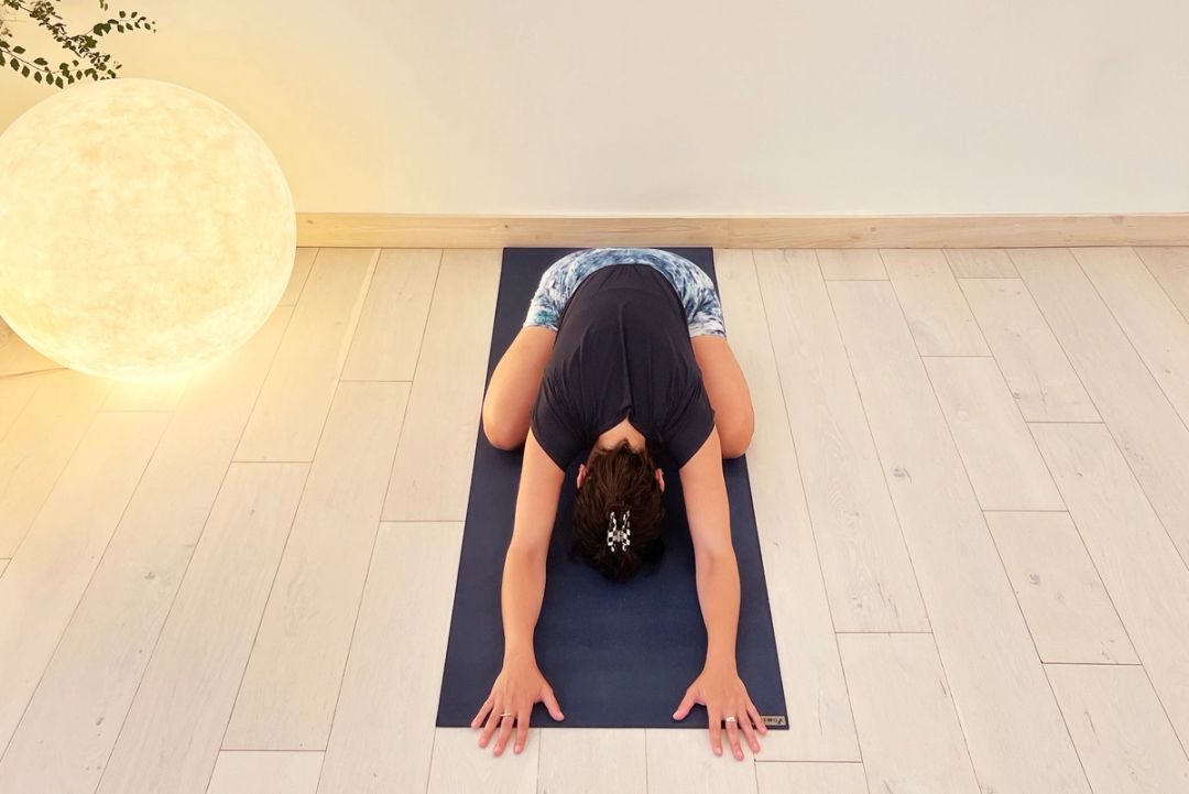 The Best Yoga Poses to Relieve Gas and Bloating | THE WELL